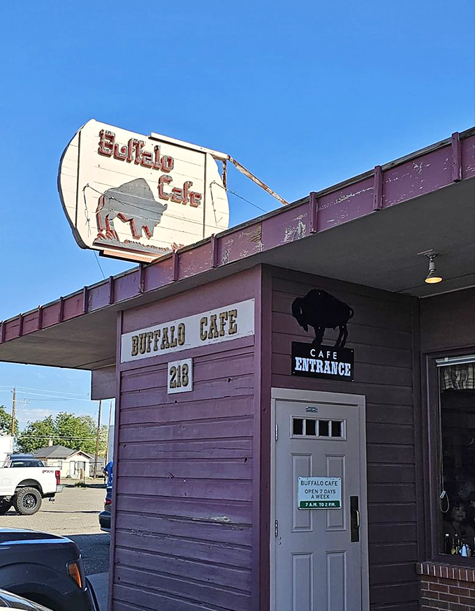 The vintage buffalo sign stands as a beacon of breakfast hope against the blue Idaho sky, calling hungry travelers home.