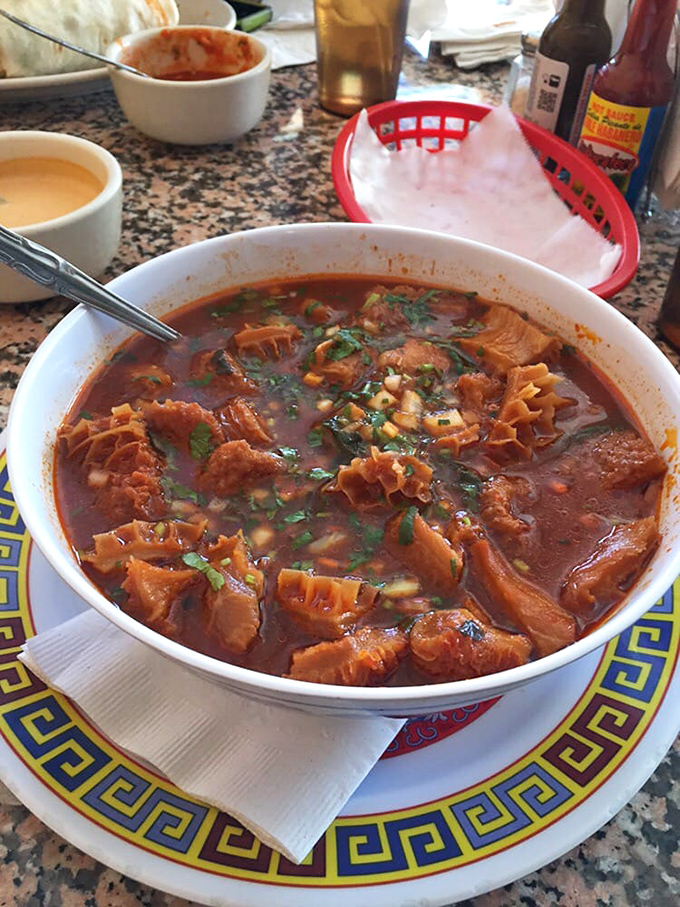 Menudo that could cure anything from hangovers to heartbreak. That rich, spicy broth with tender tripe is Mexican penicillin in a bowl.