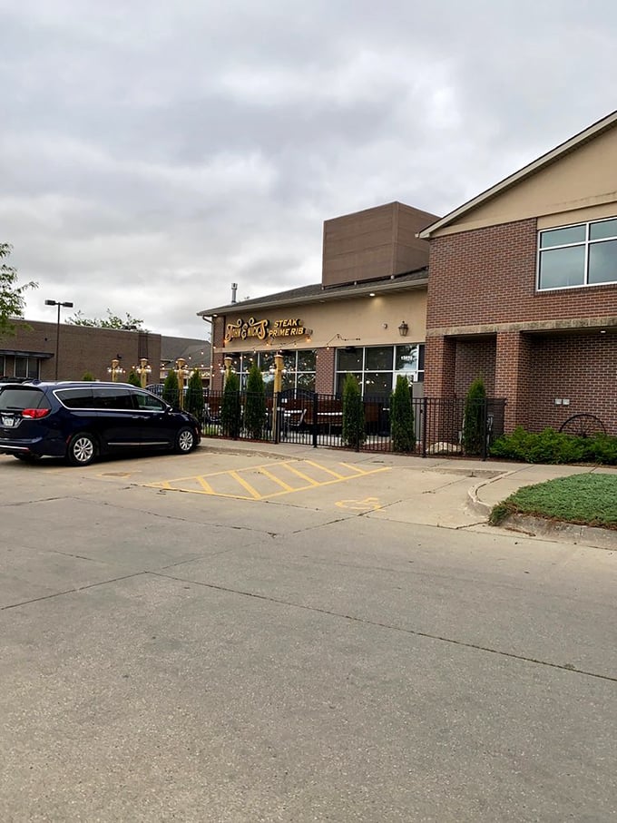 That golden sign glowing against the dusk sky isn't just restaurant signage&mdash;it's a beacon calling hungry travelers home to beef nirvana.