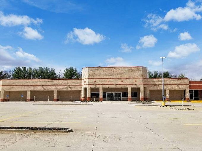 The exterior view showcases the building's previous retail life, now reincarnated as a thrifter's paradise where one person's discards become another's treasures.