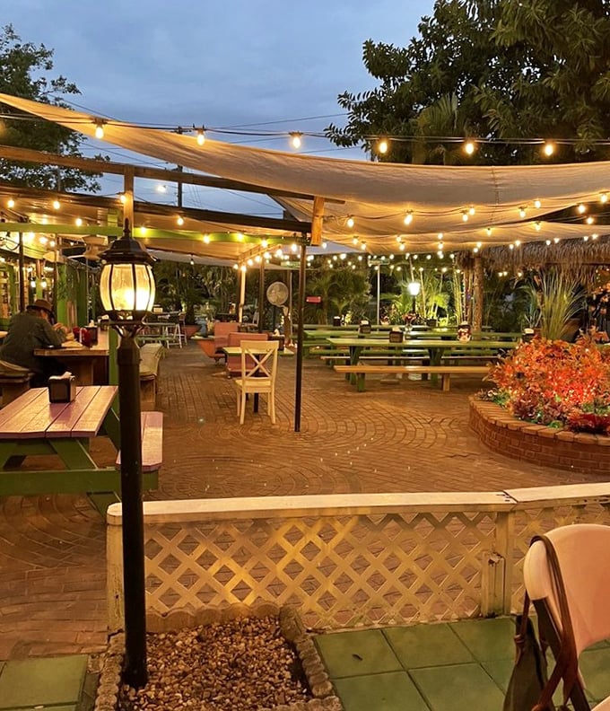 As evening falls, the patio transforms into a twinkling oasis where string lights cast a gentle glow over tables of happy diners reluctant to end their Chattaway experience.