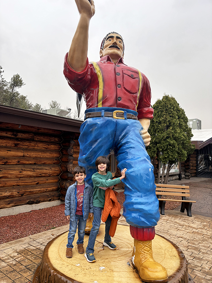 The man, the myth, the massive statue! Paul stands guard outside, silently judging if you've eaten enough pancakes to earn your lumberjack credentials.