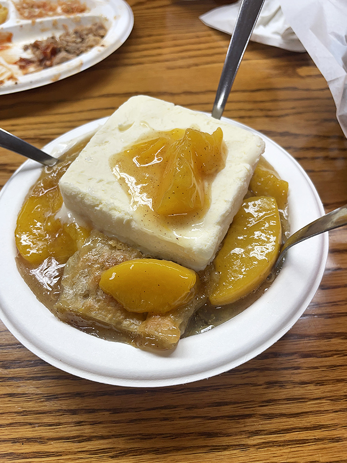 Peach cobbler with ice cream&mdash;the sweet finale to a barbecue opus. Like sunshine and childhood memories served in a bowl.