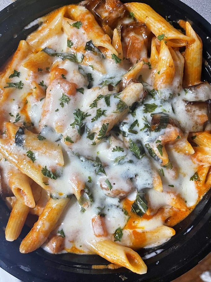This penne pasta isn't just covered in cheese&mdash;it's been adopted by it, creating a gooey family reunion in every bite.