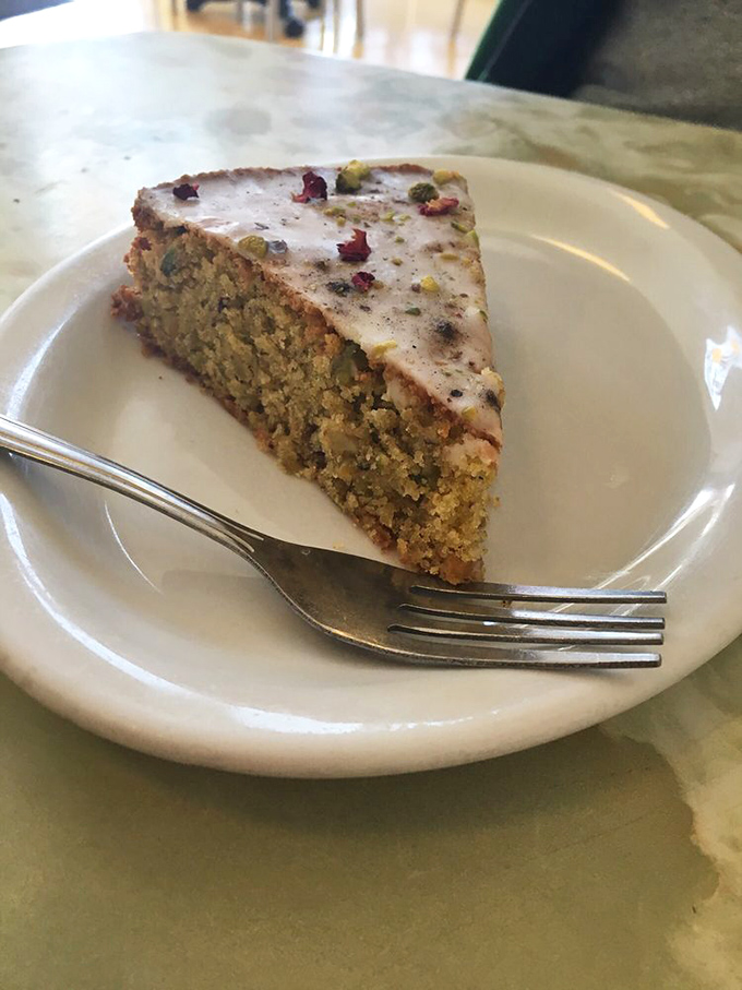 This isn't just cake&mdash;it's poetry. Pistachios and rose petals transform a simple slice into an edible sonnet that speaks directly to your soul.