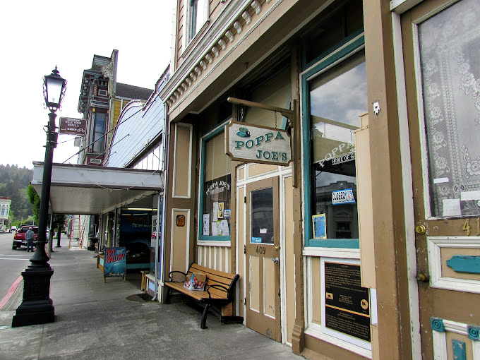 Poppa Joe's storefront maintains its vintage charm with a simple bench inviting passersby to sit a spell&mdash;small-town hospitality in architectural form.