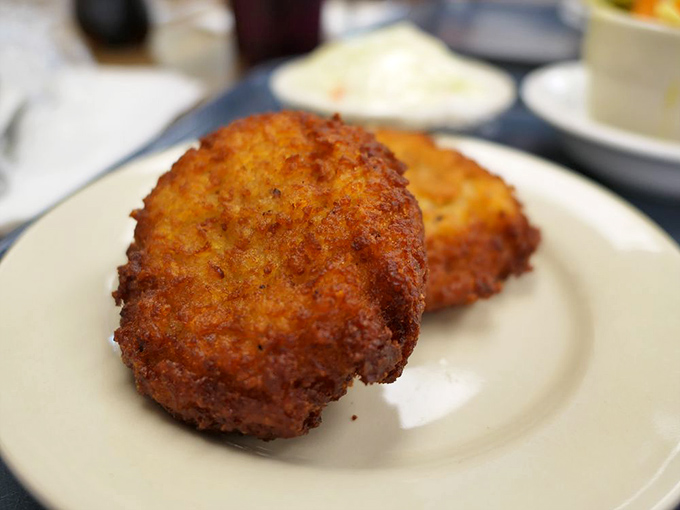 Golden-brown potato pancakes with crispy edges and tender centers&mdash;the kind that inspire fierce loyalty and occasional table-reaching.