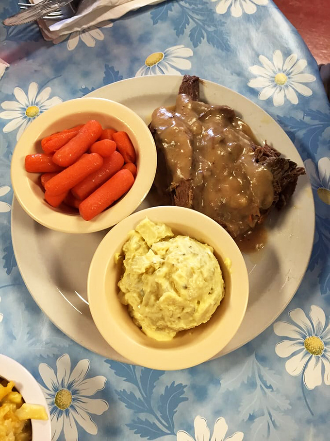 The open-faced roast beef platter is old-school dining at its finest—tender meat, rich gravy, and sides that aren't afterthoughts but essential supporting characters.