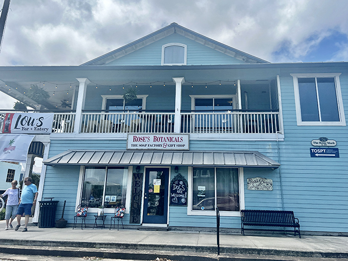 Rose's Botanicals adds a splash of coastal blue to the streetscape, proving even soap shopping becomes an experience in Apalachicola.