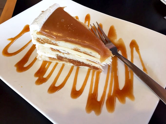 This isn't just cake &ndash; it's a salted caramel masterpiece with architectural layers that would make Frank Lloyd Wright weep with joy.