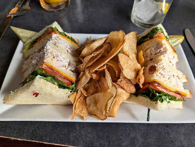 The welcoming entrance with its glowing sign beckons hungry travelers like a lighthouse for the famished.