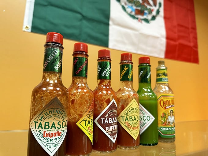 The hot sauce lineup—where brave souls find their match and flavor seekers discover their perfect companion for culinary adventure.