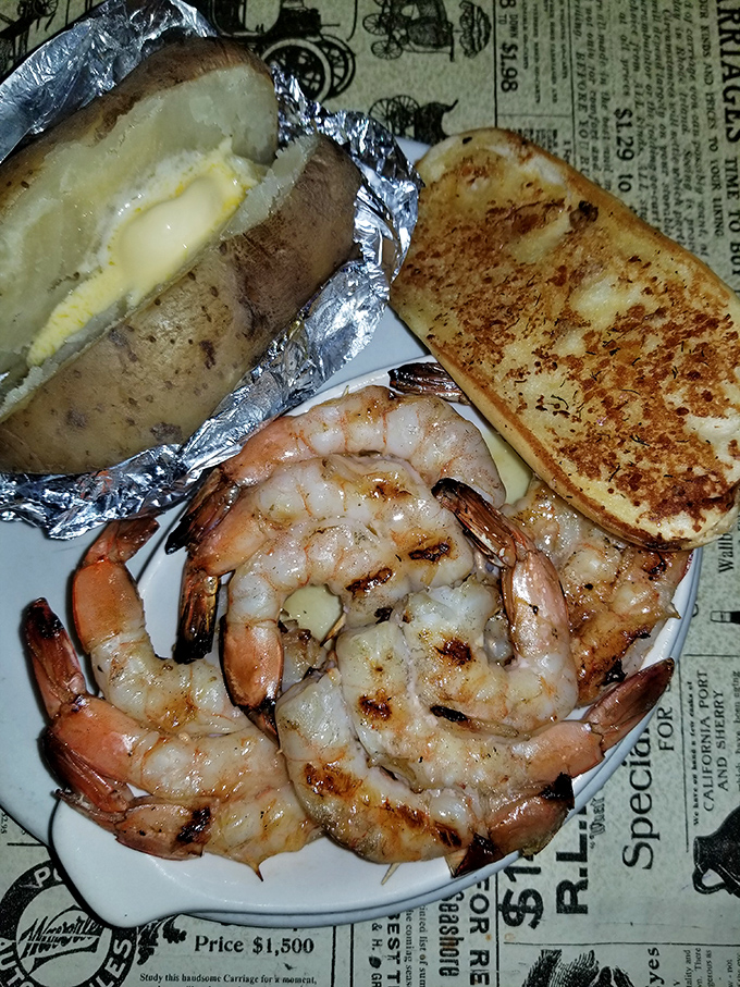 Jumbo shrimp grilled to perfection alongside a butter-soaked potato. Surf and turf's country cousin just showed up to the party.