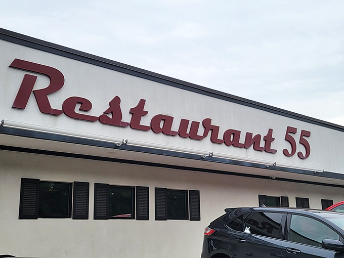 The sign that beckons burger pilgrims from miles around. Not all heroes wear capes&mdash;some wear neon and serve perfect patties.