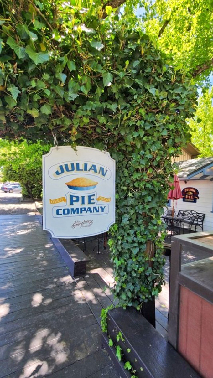The sign that's launched a million U-turns. "Just five more minutes," said every driver who spotted this ivy-framed beacon.