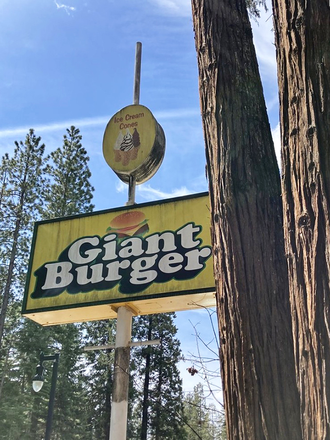 The iconic yellow sign that's guided hungry travelers for generations. Like a burger lighthouse cutting through the fog of mediocre roadside options.