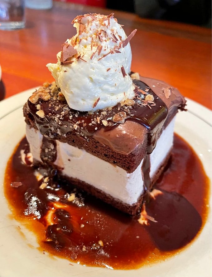 A chocolate dessert so decadent it should come with a warning label. That whipped cream crown isn't garnish&mdash;it's necessary emotional support for the experience below.