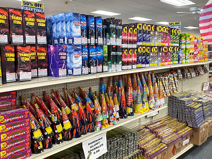 An entire wall dedicated to making things go boom, arranged with the care and precision of a fireworks sommelier.