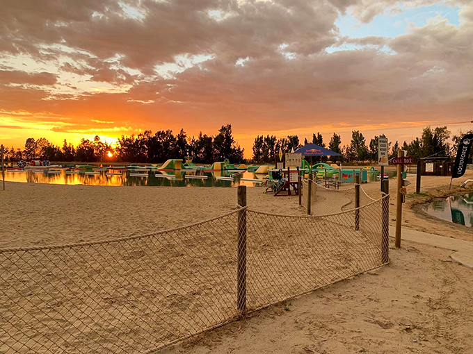 As the California sun sets over Wake Island, the water glows with golden promise, whispering, "Come back tomorrow&mdash;your muscles will stop hurting eventually."