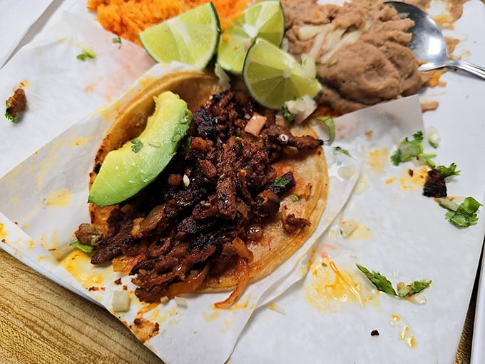 A taco so authentic it should come with its own passport. The avocado slice is like the cherry on top, if cherries were green and creamy.