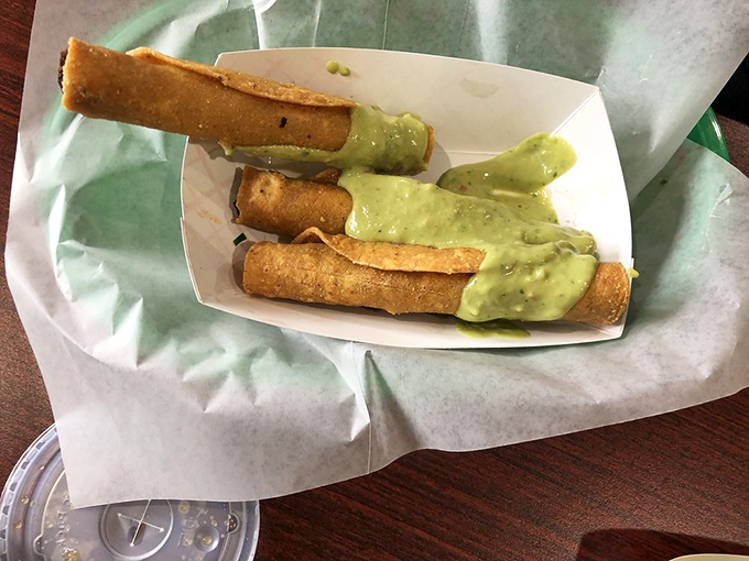 Taquitos &ndash; the crispy, rolled treasures that prove sometimes the best things in life are simple: tortillas, filling, and that heavenly green sauce for dipping.