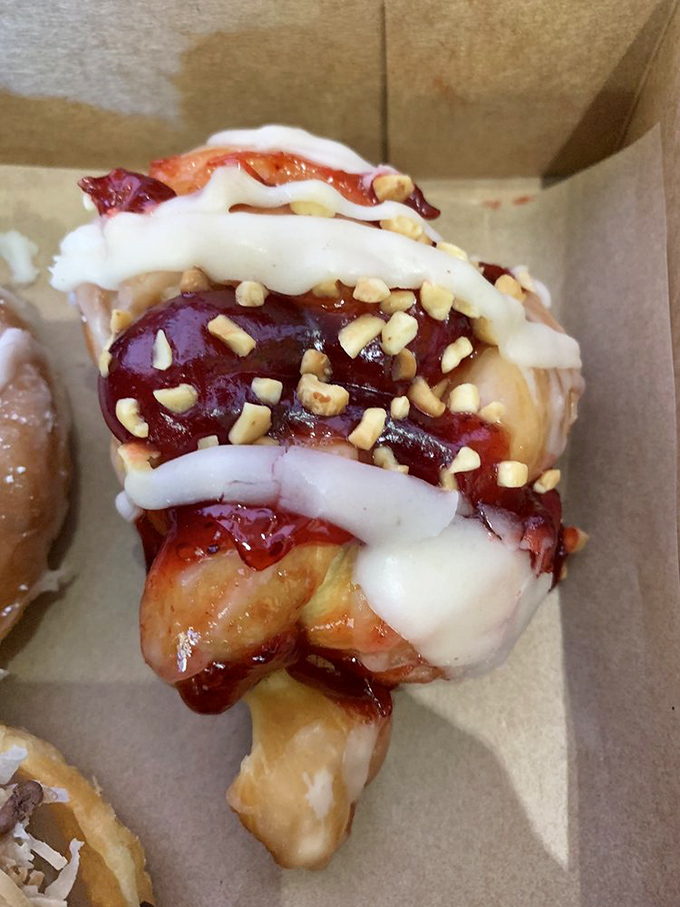Not just a jelly donut, but a full-on jam session with white drizzle and chopped nuts playing backup to the sweet-tart headliner.