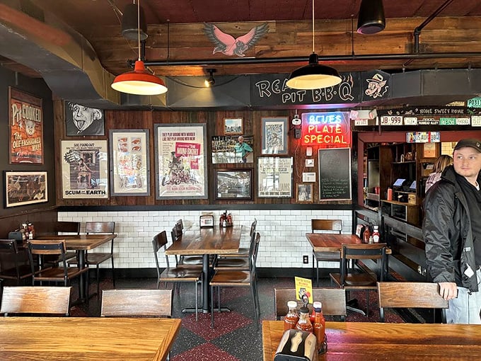 A barbecue shrine where vintage posters and neon signs create the perfect backdrop for the religious experience of properly smoked meat.