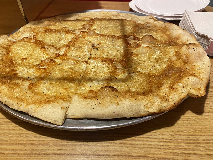 The iconic storefront on Somerset Street&mdash;where pizza dreams come true if you've planned ahead. That neon sign has guided hungry Philadelphians for generations. 