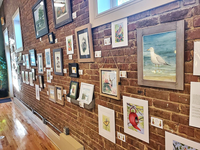 The gallery wall proves that Community Bakery feeds both stomach and soul &ndash; local art finds a home among the aromas of fresh bread.