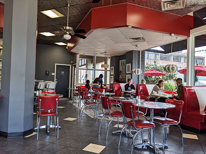 The dining room buzzes with the satisfied murmurs of happy eaters. Those red chairs have witnessed countless "first bite" faces of pure delight.