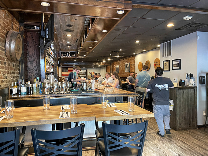 The bar area balances rustic charm with urban energy&mdash;a perfect perch to contemplate life's important questions, like "Should I order another burger?"