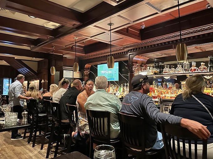 The bar at Abe & Louie's&mdash;where strangers become friends, deals are sealed, and the perfect Manhattan is just a nod away.