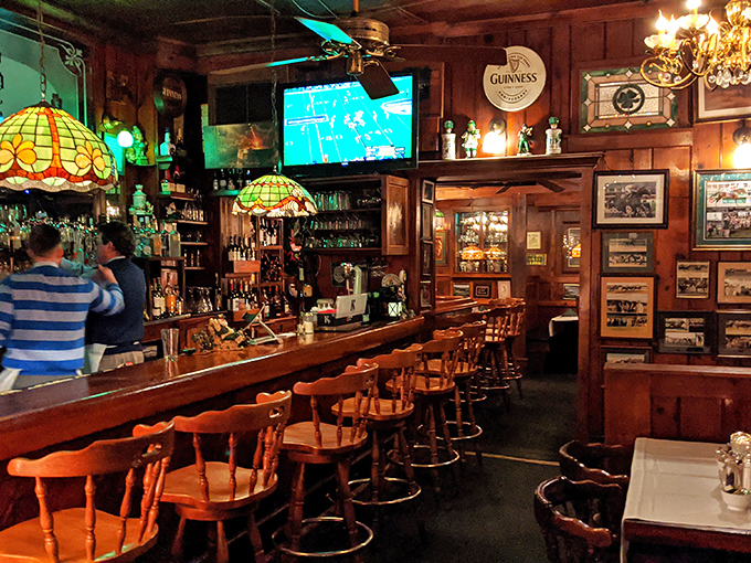 The bar area feels like it's been serving perfect pours since bourbon was invented. Those Tiffany-style lamps have witnessed countless Louisville celebrations.