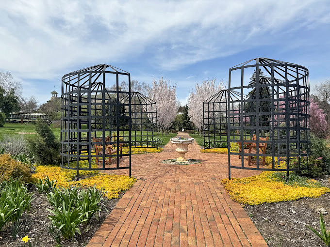 Geometric garden structures create living rooms without walls. The ultimate open concept design, with better ventilation than any HGTV renovation.