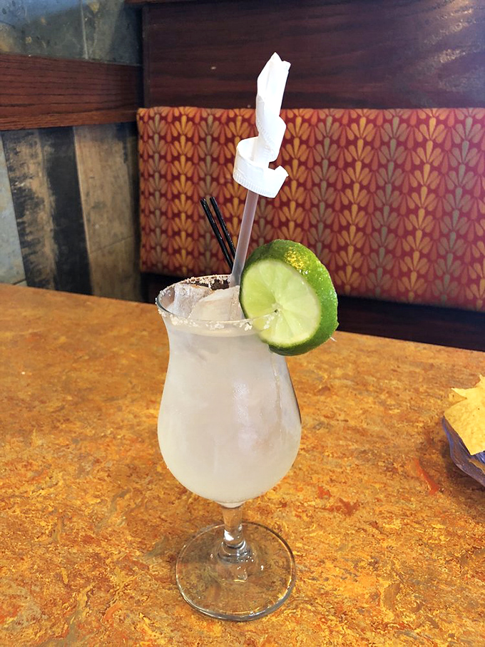 A frosty margarita with its salt-rimmed edge and lime garnish stands ready to cool the fire of green chile&mdash;the perfect liquid sidekick to any New Mexican feast.