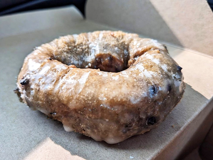 Pink perfection with rainbow accessories. This sprinkle-laden beauty is like the prom queen of the donut case – impossible to ignore and universally adored.
