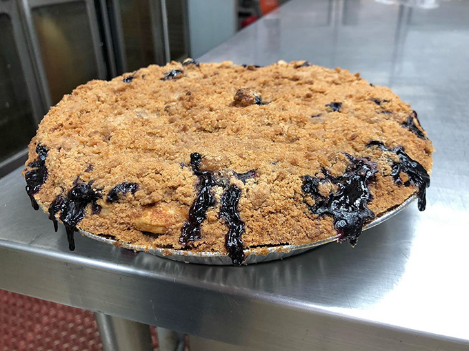 This Blueberry Crumb pie with its bubbling fruit and golden topping is what happens when berries fulfill their highest calling in life.