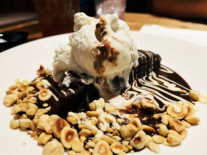 Chocolate brownie sundae with vanilla ice cream and hazelnuts. Because after conquering the sea, you deserve to conquer dessert too.
