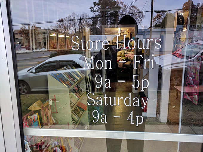 The window displays more than just business hours – it's the schedule for your appointment with serendipity and unexpected discoveries.