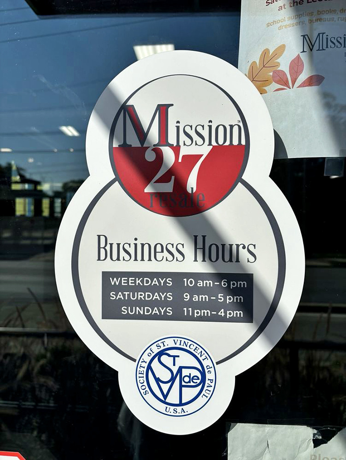 The door sign that tells you when to come hunting—and reminds you that your purchases help support St. Vincent de Paul's community mission.