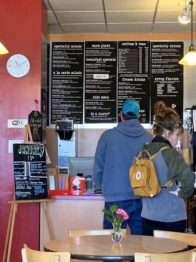 The cafe menu board: where literary appetites meet actual hunger, and both are satisfied with equal care.
