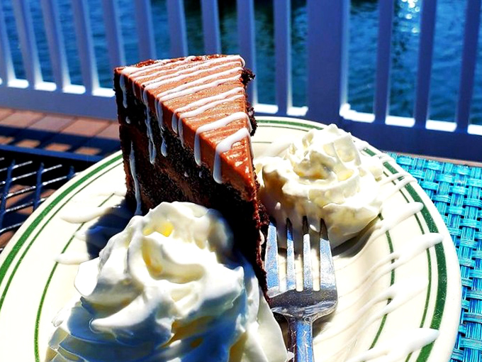 Chocolate cake with caramel drizzle&mdash;because after conquering the sea's bounty, your sweet tooth deserves its own maritime adventure.
