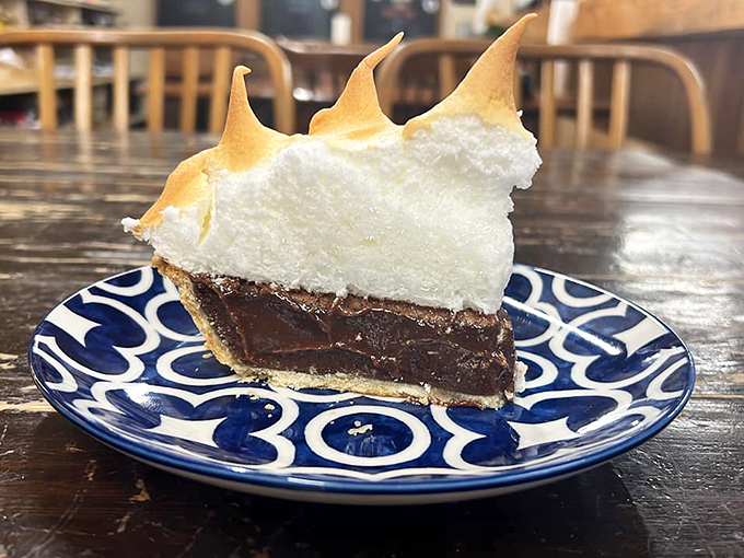 A chocolate meringue pie with peaks so perfect they deserve their own topographic map. Worth every delicious calorie.