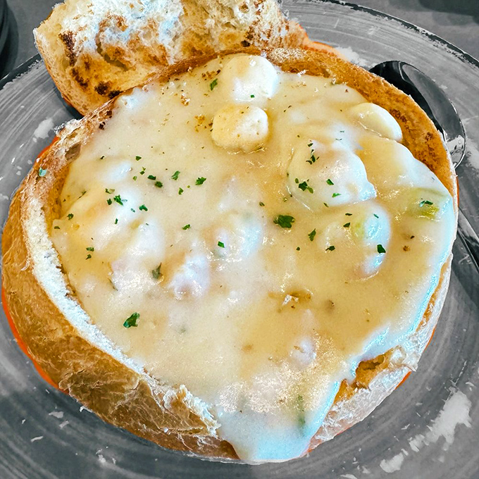Clam chowder served in a sourdough bread bowl—the soup that eats like a meal and leaves no dishes to wash!