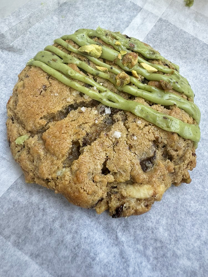 Not all heroes wear capes—some wear green drizzle atop golden-brown cookie perfection that demands to be enjoyed with coffee.
