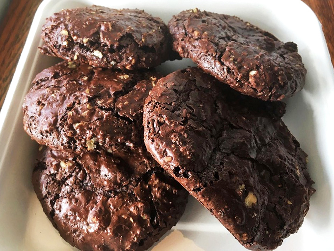 Chocolate cookies with the ideal texture: crisp edges giving way to fudgy centers. The kind that make you consider ordering a dozen "for later."