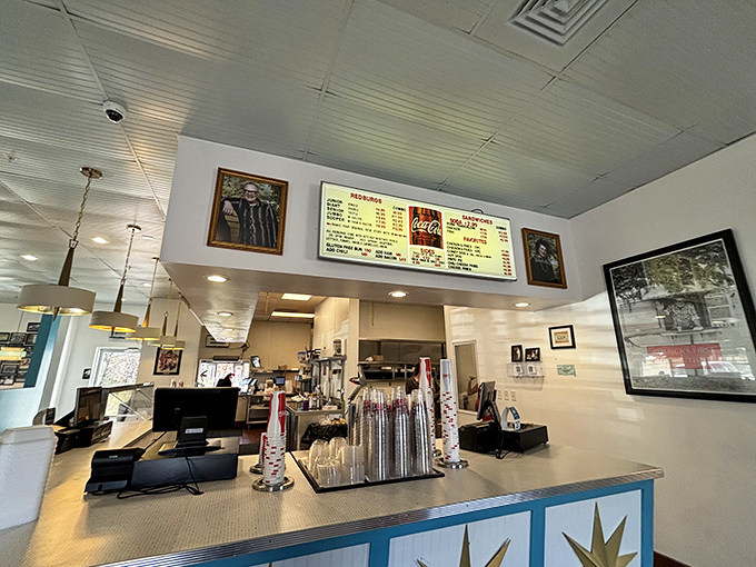 The ordering counter stands like mission control for your taste buds, where dreams of burgers and shakes are launched into delicious reality.