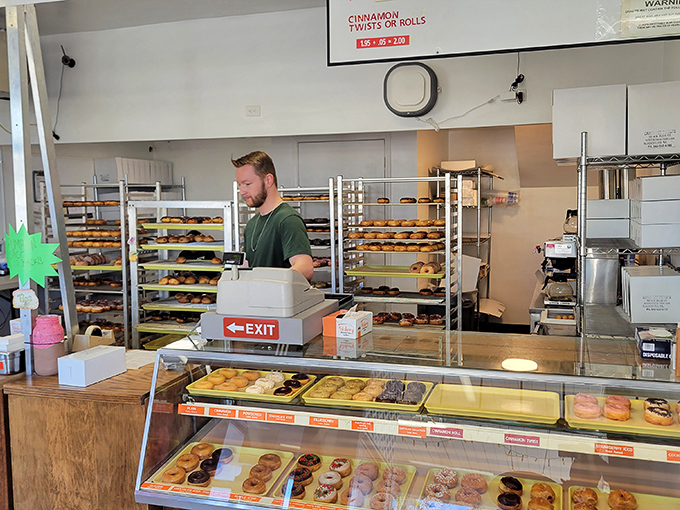 Behind the counter magic&mdash;where ordinary ingredients transform into extraordinary pleasures. The donut whisperer at work in his natural habitat.