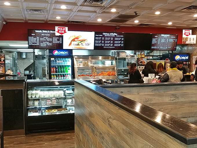 Where the magic happens: the counter area bustling with activity, like a well-choreographed dance of comfort food preparation.