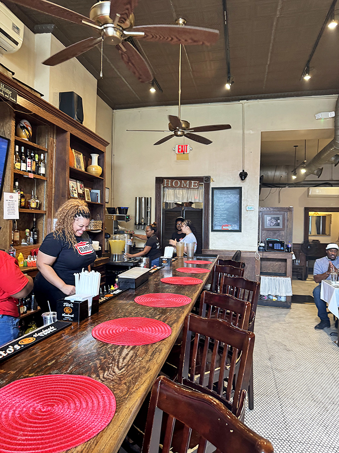 The bar where magic happens behind the scenes, with red placemats as inviting as the "Welcome" mat at your favorite relative's house.